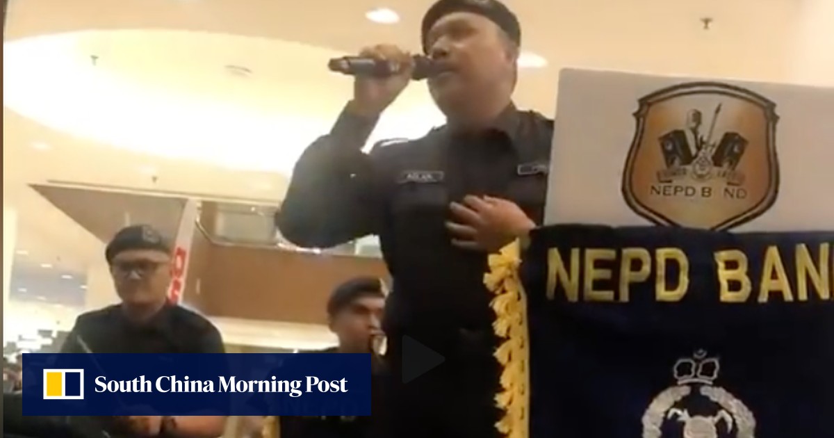 Malaysian police band goes viral for perfectly singing Cantonese hit ...
