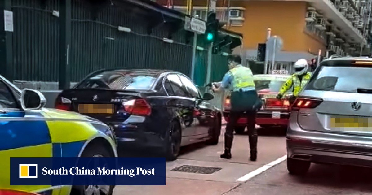 Hong Kong Police Officer Draws Gun In Attempt To Stop Driver Over