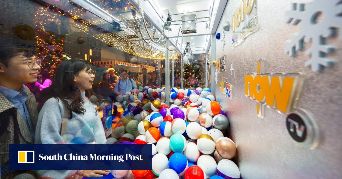 Operation Santa Claus: giant claw game at festive fair helps HKT ...
