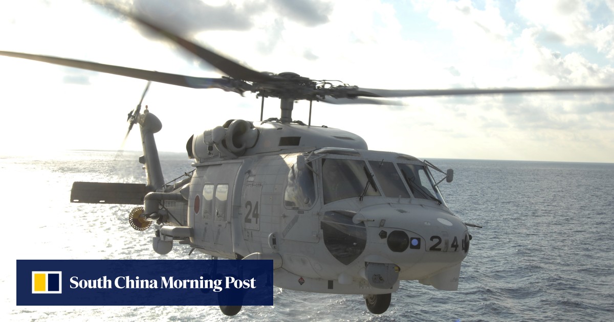 1 dead, 7 missing at sea after Japan navy helicopters crash over ...