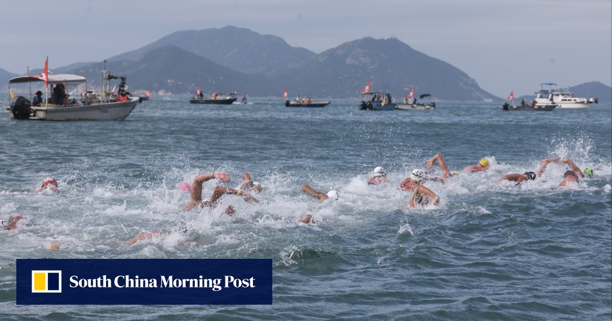 Tropical Cyclone Trami: swimmers battle choppy seas, gathering storm in ...