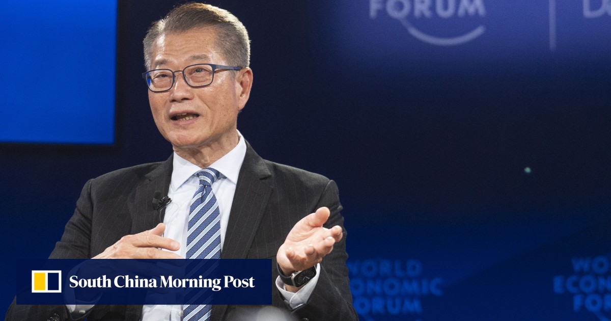 Hong Kong’s Paul Chan defends city’s currency peg to US dollar in Davos ...