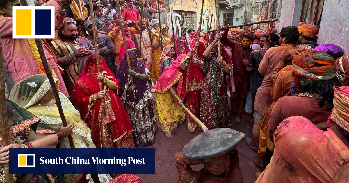 Video | Hindu women in India playfully beat men with sticks during ...