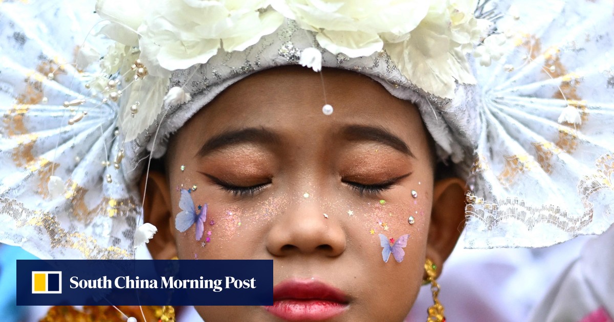 Photos of vivid Buddhist celebration in Thailand that’s a rite of ...