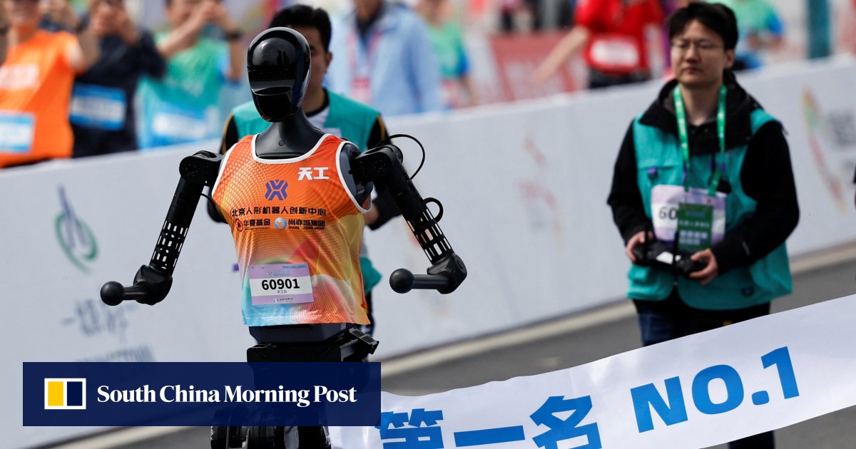 Running robots put through their paces alongside humans in Beijing half ...