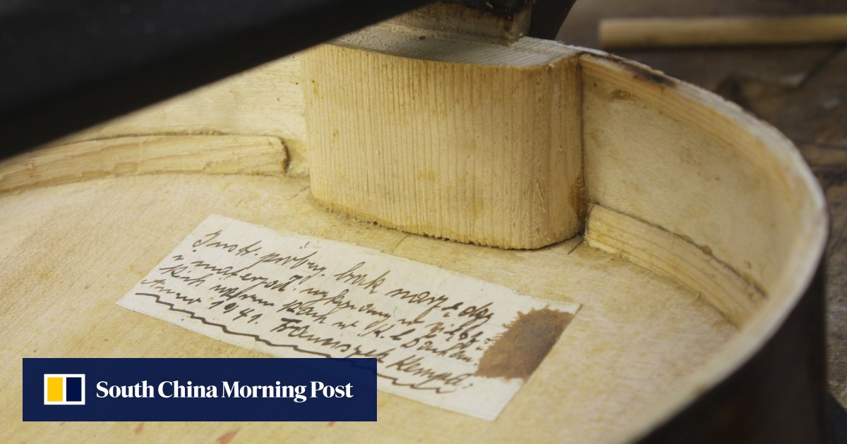 Secret message discovered in violin reveals its Nazi camp origins and a ...