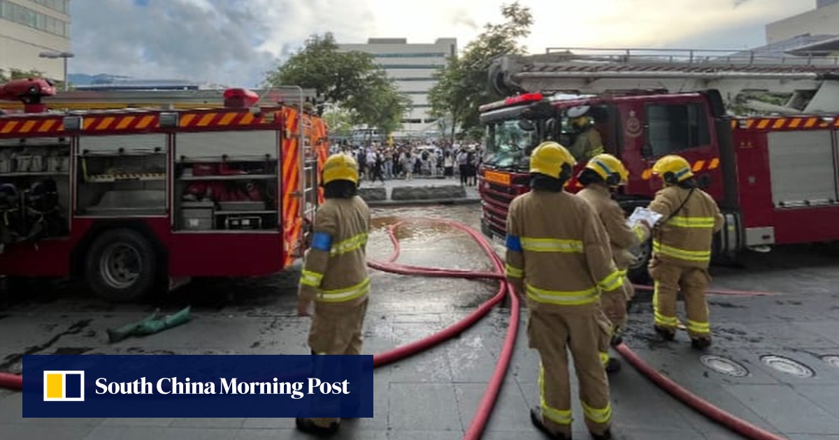 Workers flee as thick smoke spews from Cathay headquarters in Hong Kong ...