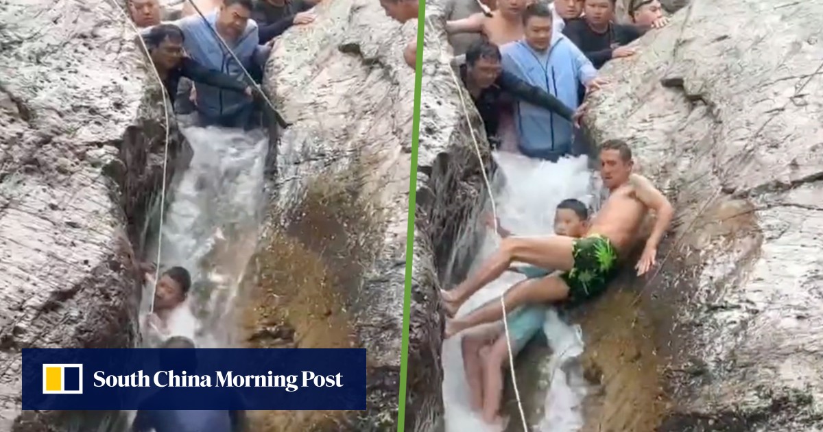 ‘Human barrier’: Chinese men rescue boy trapped between huge rocks in ...