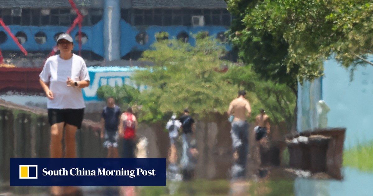 Hong Kong issues amber rainstorm warning after intense heatwave grips ...