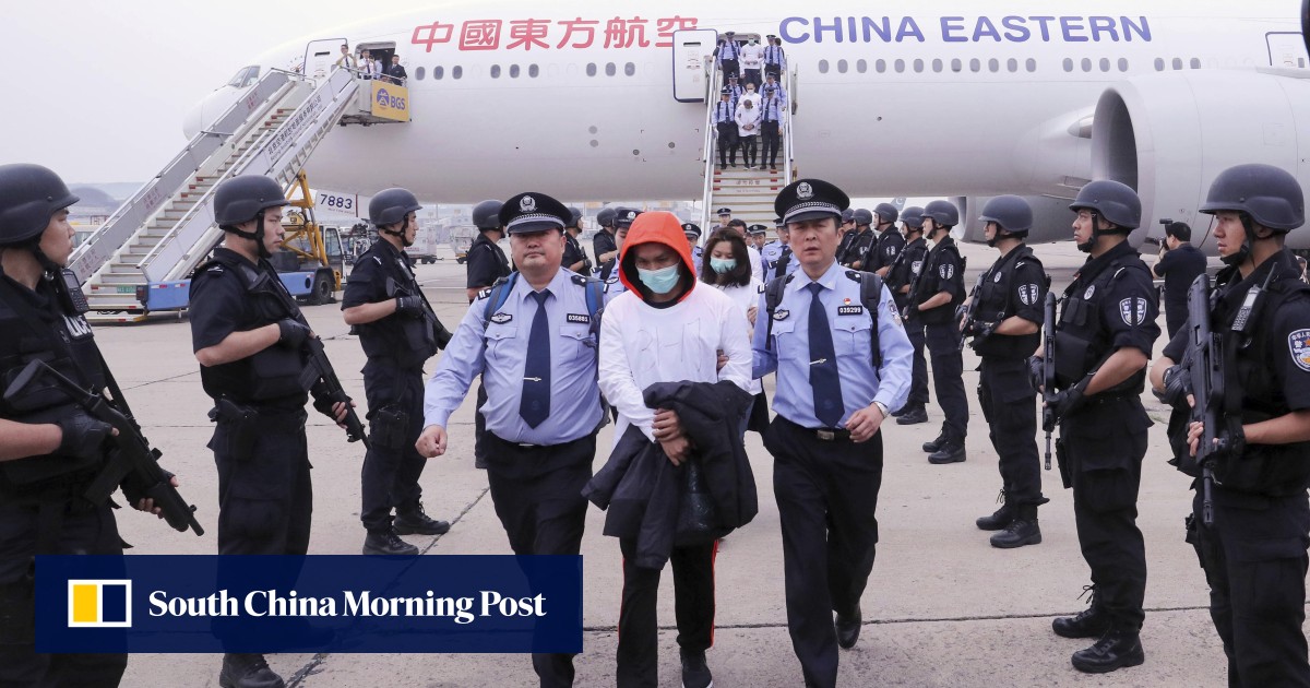 94 Taiwanese telecom fraud suspects extradited from Spain arrive in ...