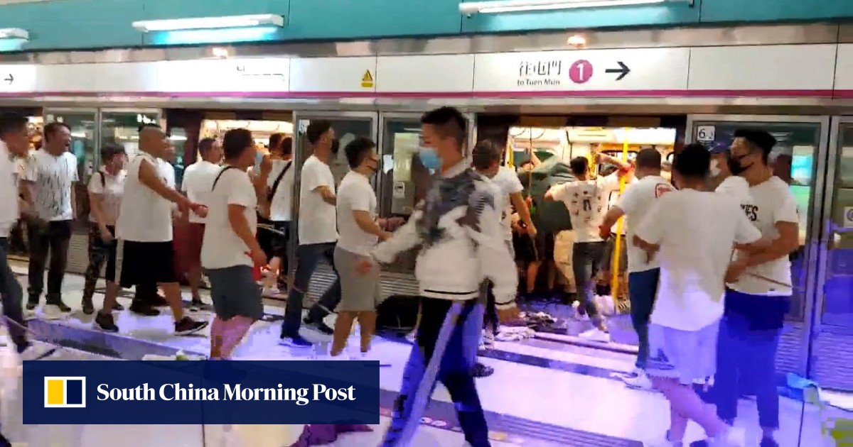 Two men charged with rioting over Hong Kong train station attack on ...