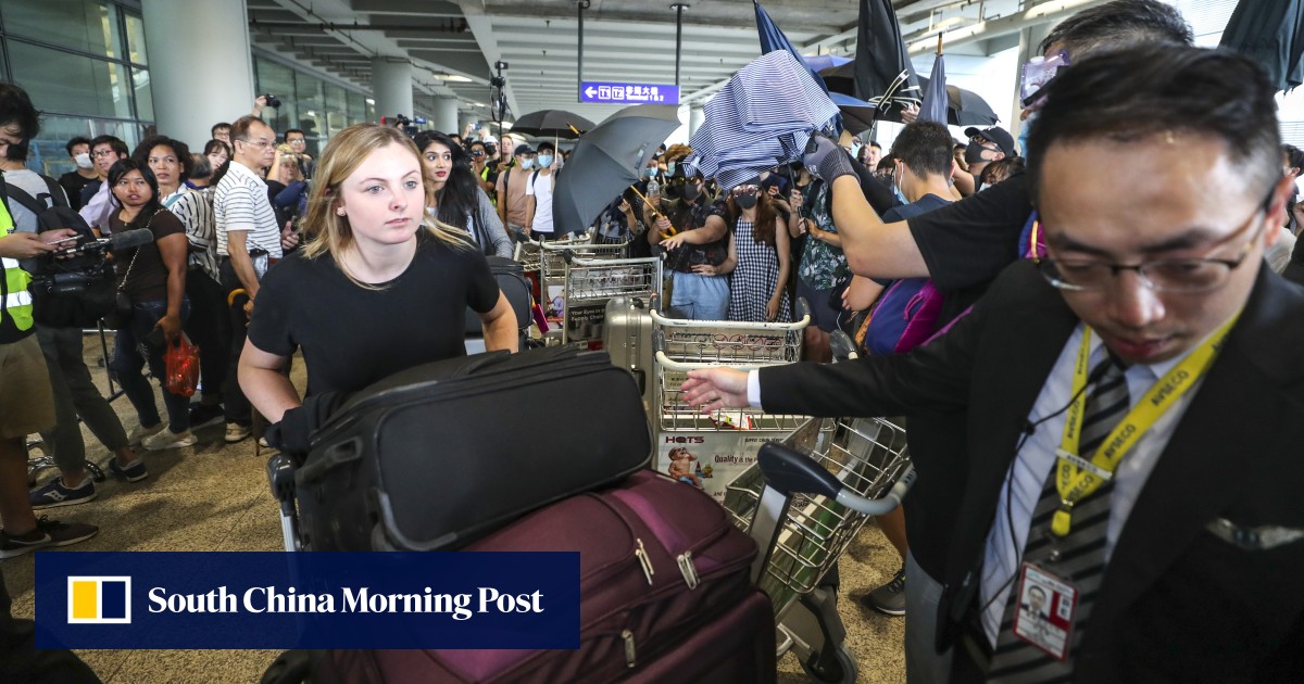 Travellers choose walking over gridlock as anti-government protesters ...