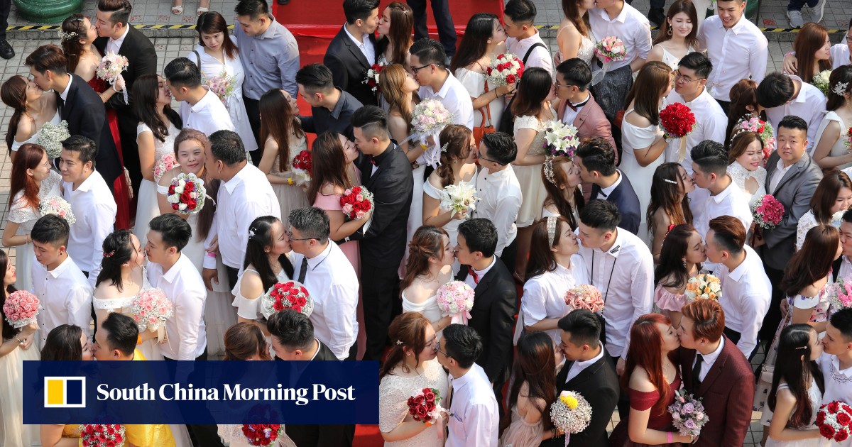 99 ethnic Chinese couples tie knot in Malaysian mass wedding on ...