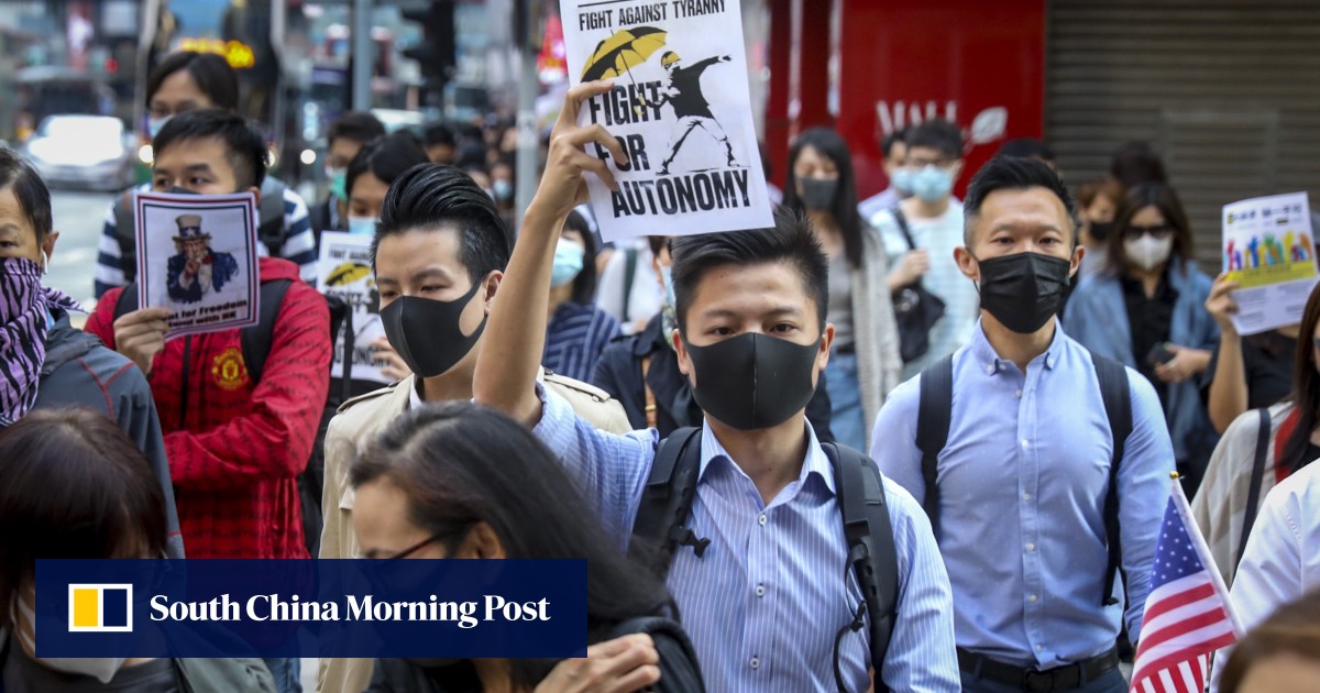 Hundreds Of Office Workers March Across Hong Kong In Protest Against