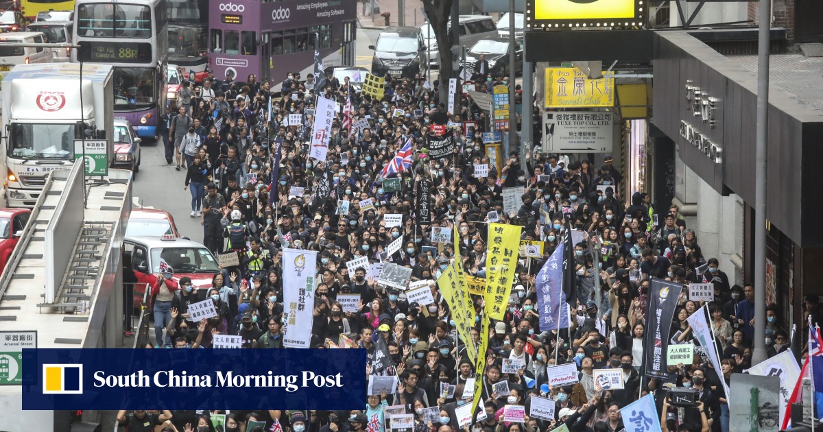 Social Workers Take To Hong Kong Streets To Urge International