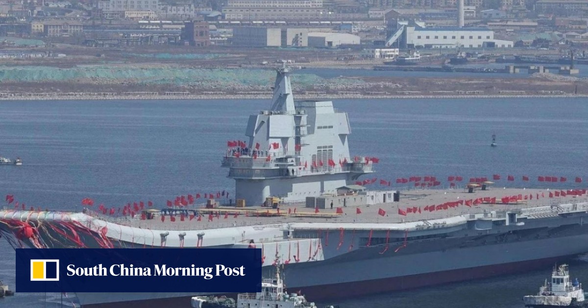China’s aircraft carrier the Shandong sails through Taiwan Strait after ...
