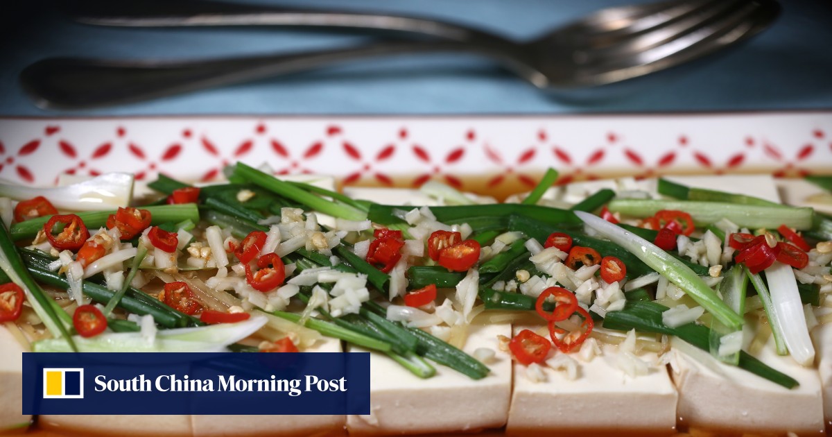 Two light Asian vegetarian dishes: steamed tofu with ginger and glass ...
