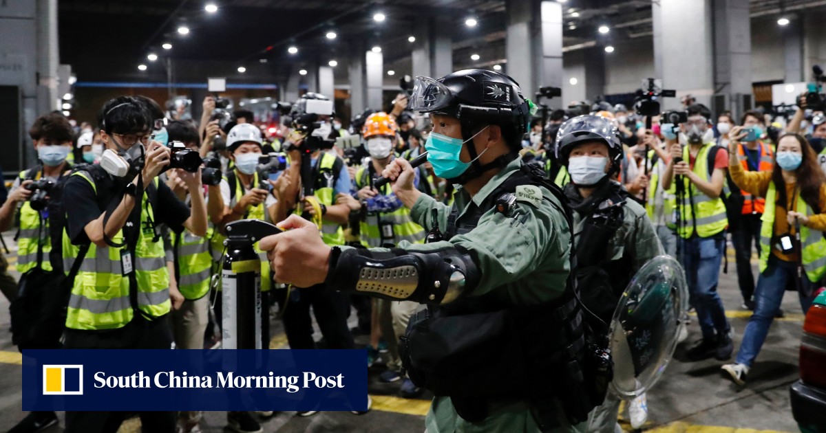 Hong Kong Protests Anger After Reporter Knocked Down During Police