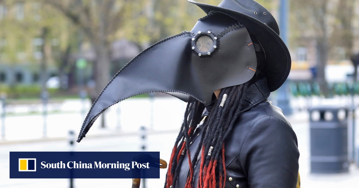 Artists make light of now-mandatory accessory, the face mask, in ...