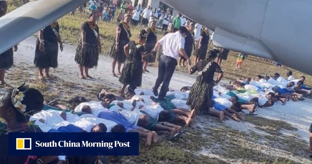 Chinese diplomat pictured walking on locals’ backs highlights Pacific ...