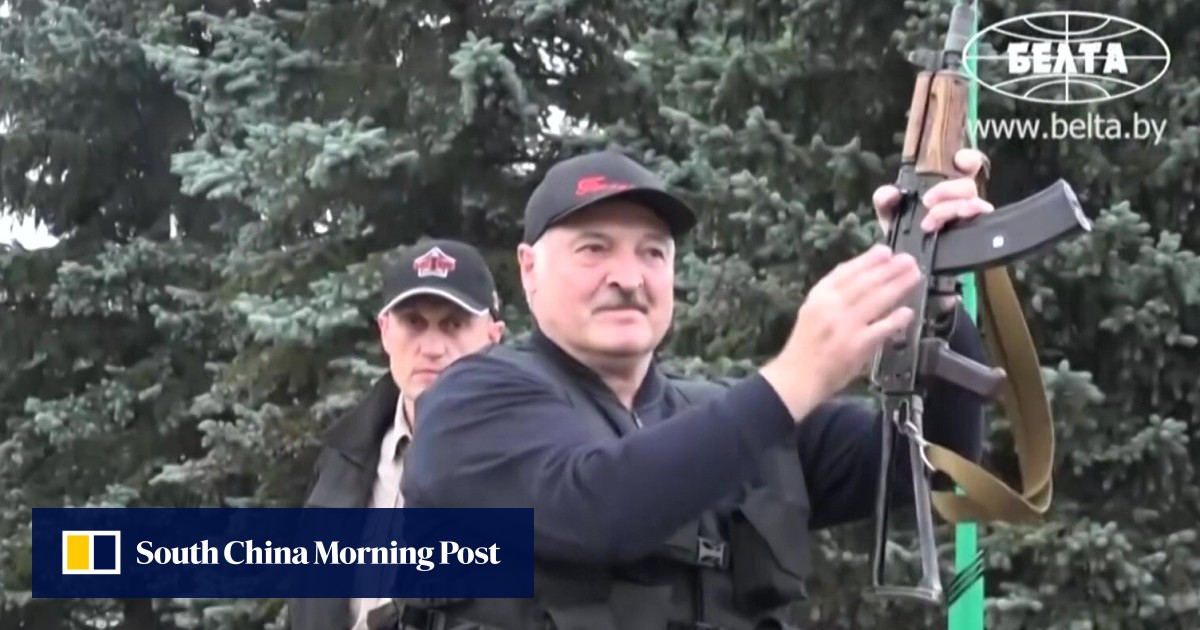 As 100,000 marched in Belarus capital, Lukashenko armed himself with a ...