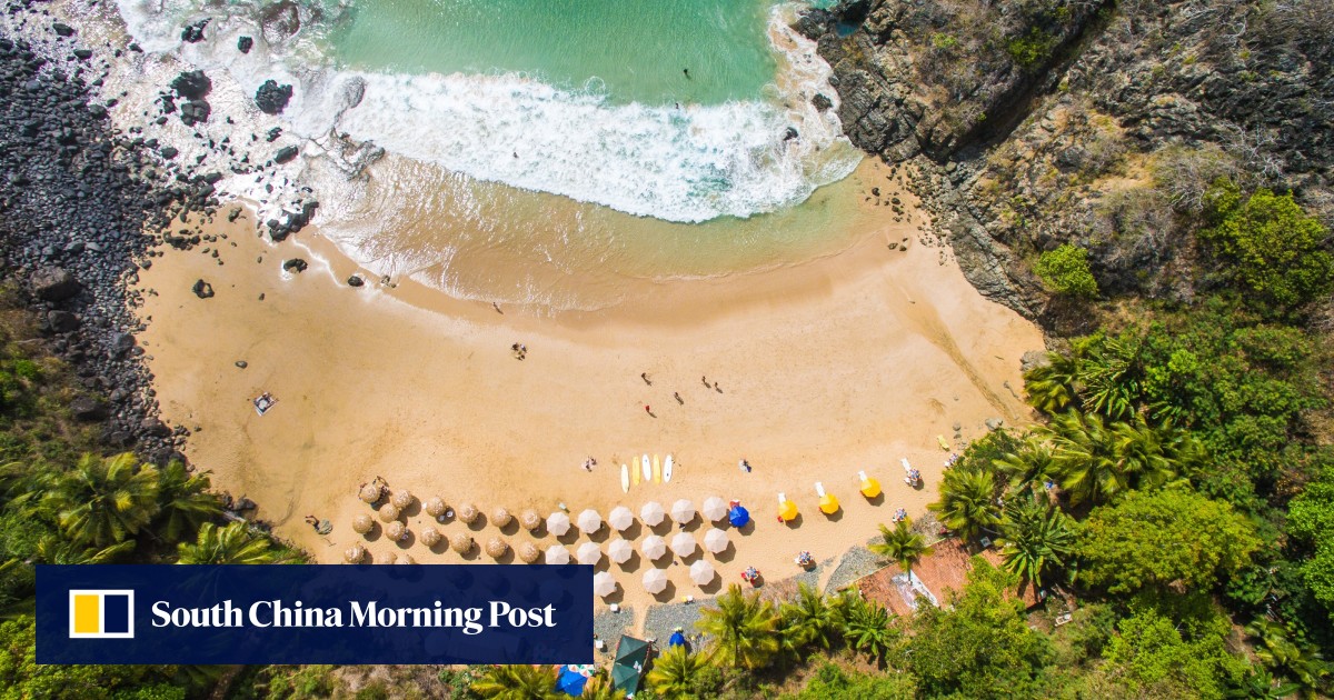 Brazilian island reopens to welcome tourists, but only if they’ve had ...