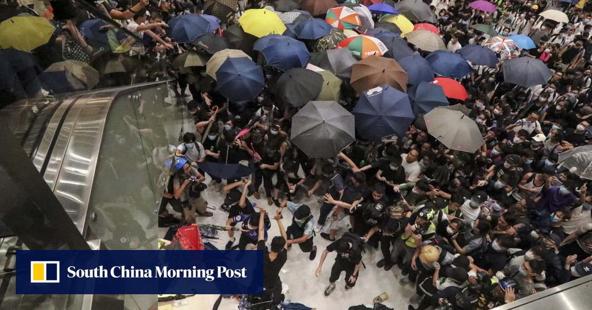 Hong Kong protests: two men, teenager jailed for up to four years over ...