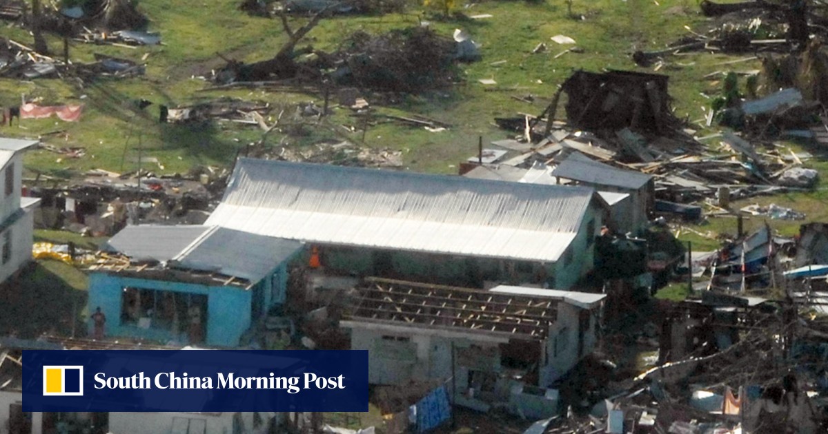 Tourists flee Fiji as cyclone death toll hits 17, with villages ...