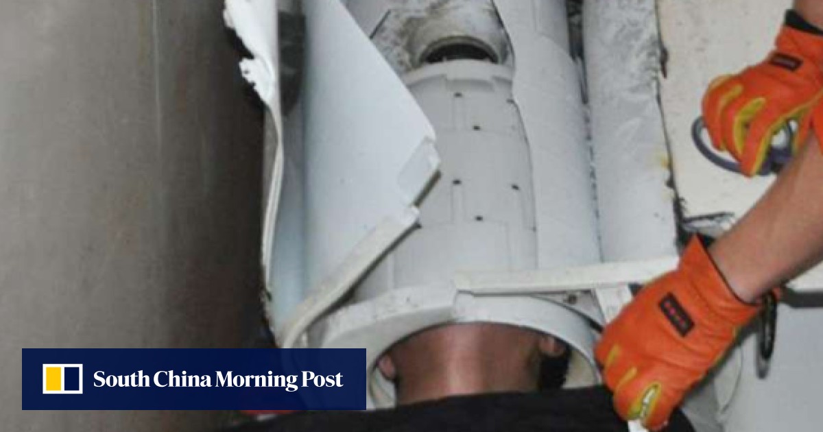 Chinese man with head stuck in washing machine rescued by fire crew ...