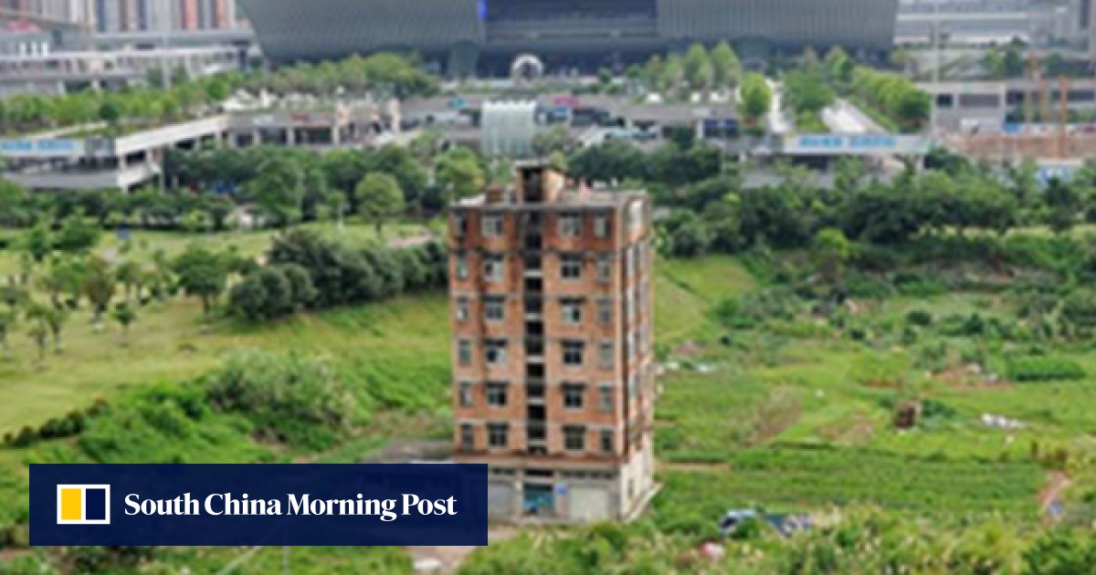 Last one standing: housing block in southern China solitary survivor ...