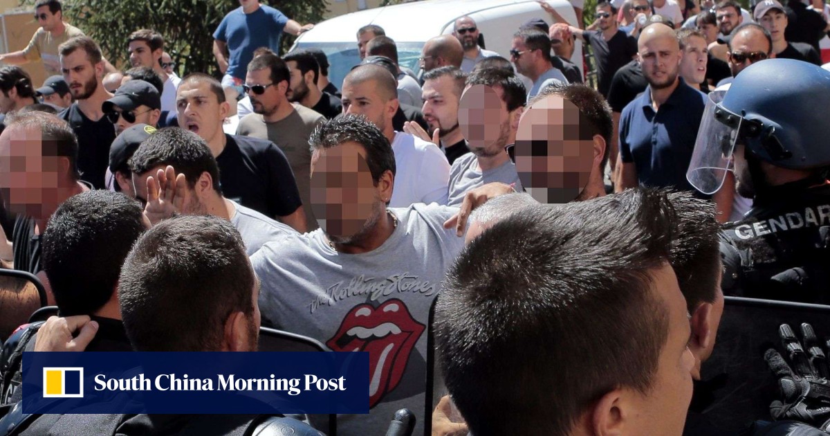 Burqini battle: clashes on Corsica injure five, triggering protests and ...