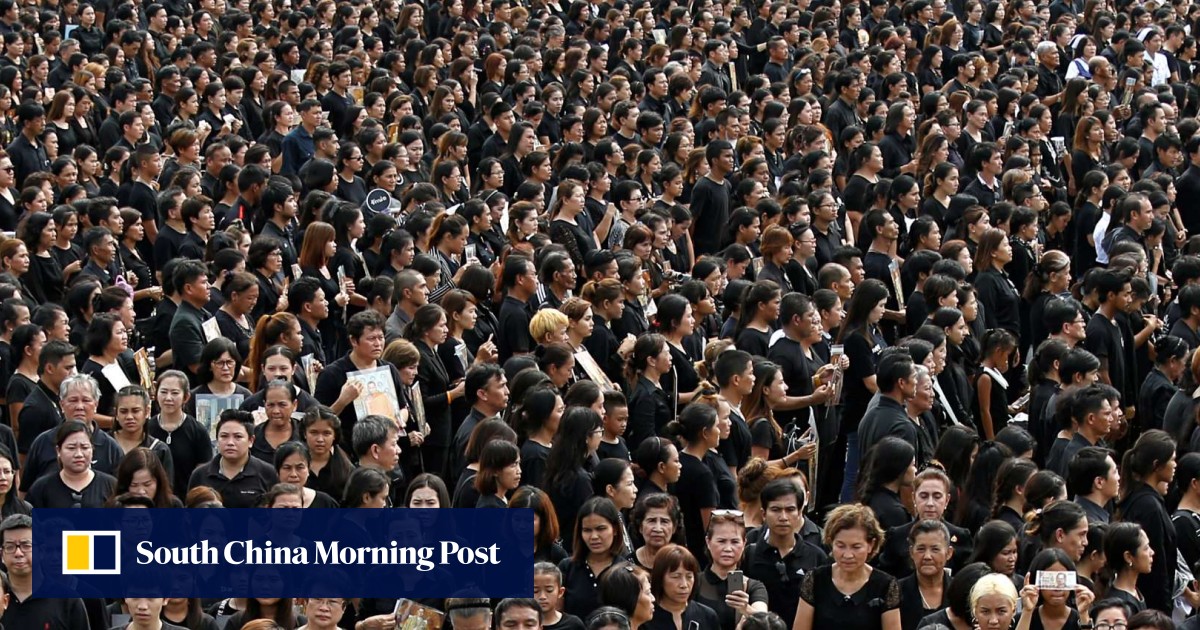 Bangkok in black: massive crowd of mourners sing national anthem in ...
