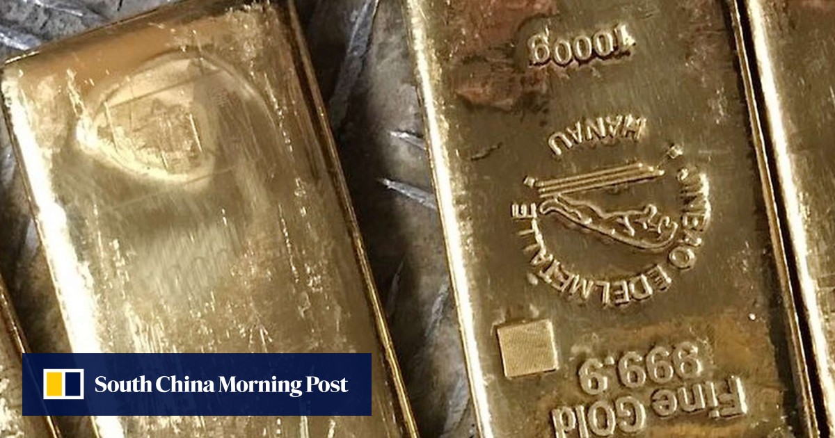 Hong Kong police arrest two suspects, recover gold bars in heist ...