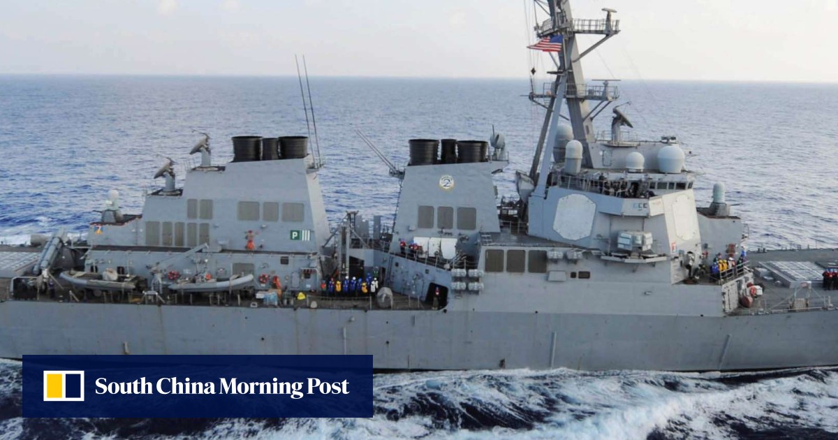 US Navy destroyer fires warning shots at Iranian fast-attack boats in ...