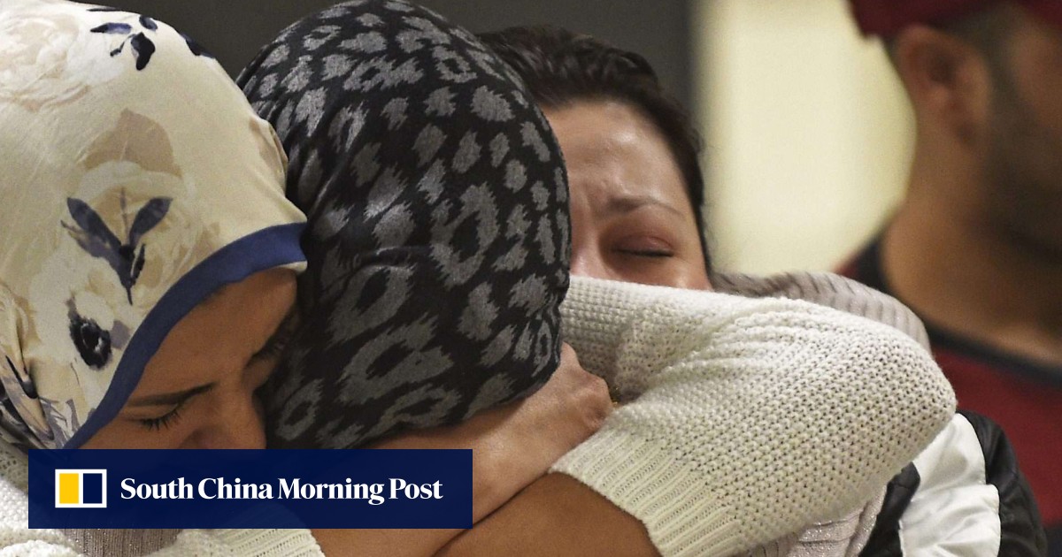 Travellers from Muslim nations arrive in US to hugs and tears after ...