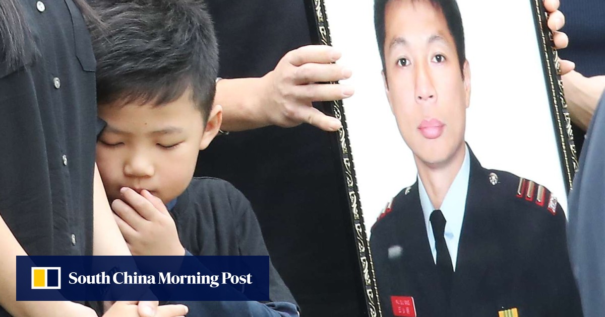 Family of Hong Kong fireman who died in clifftop rescue gets government ...