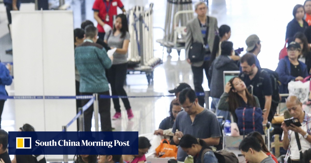 Hong Kong airport scrambles to process flight backlog after Typhoon ...