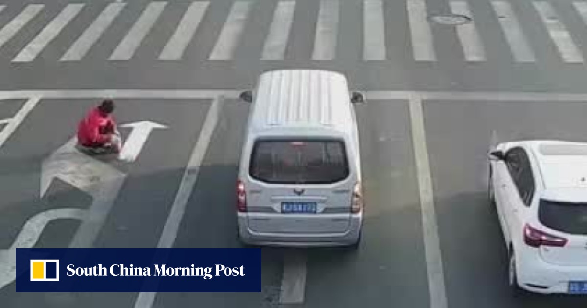 Chinese man repaints road markings to make his commute quicker | South ...