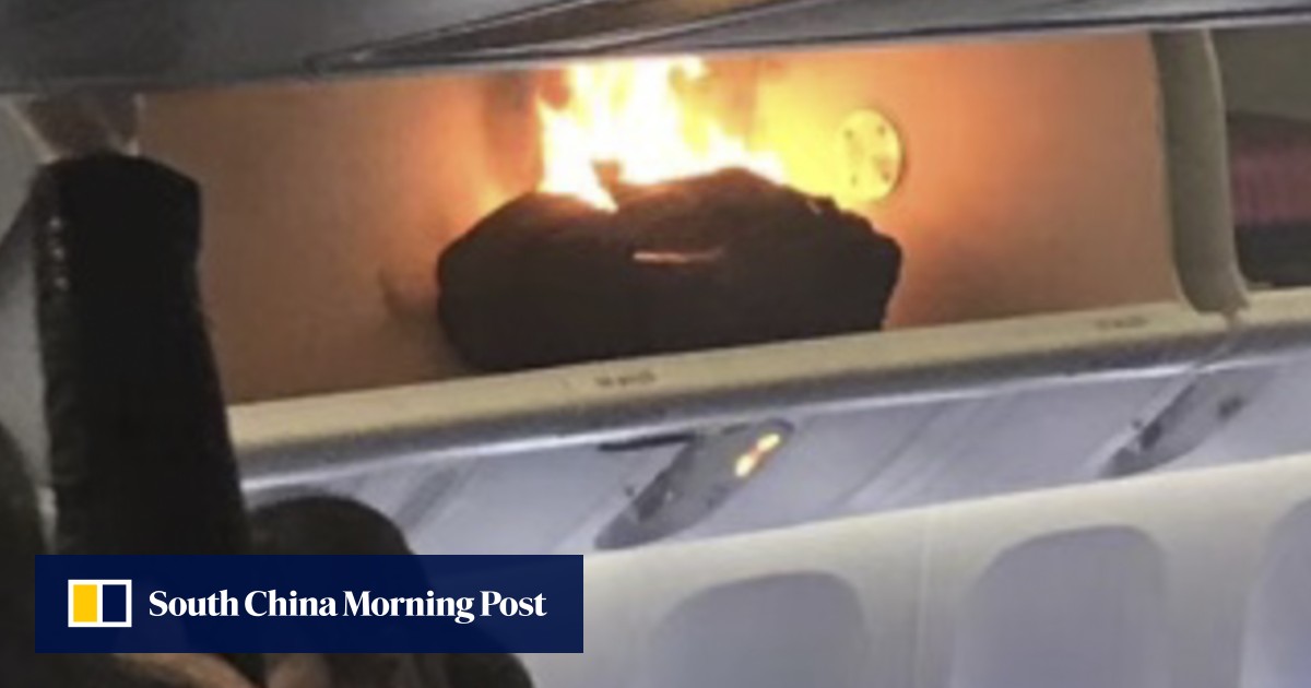 Fire breaks out in overhead locker as passengers board plane at ...