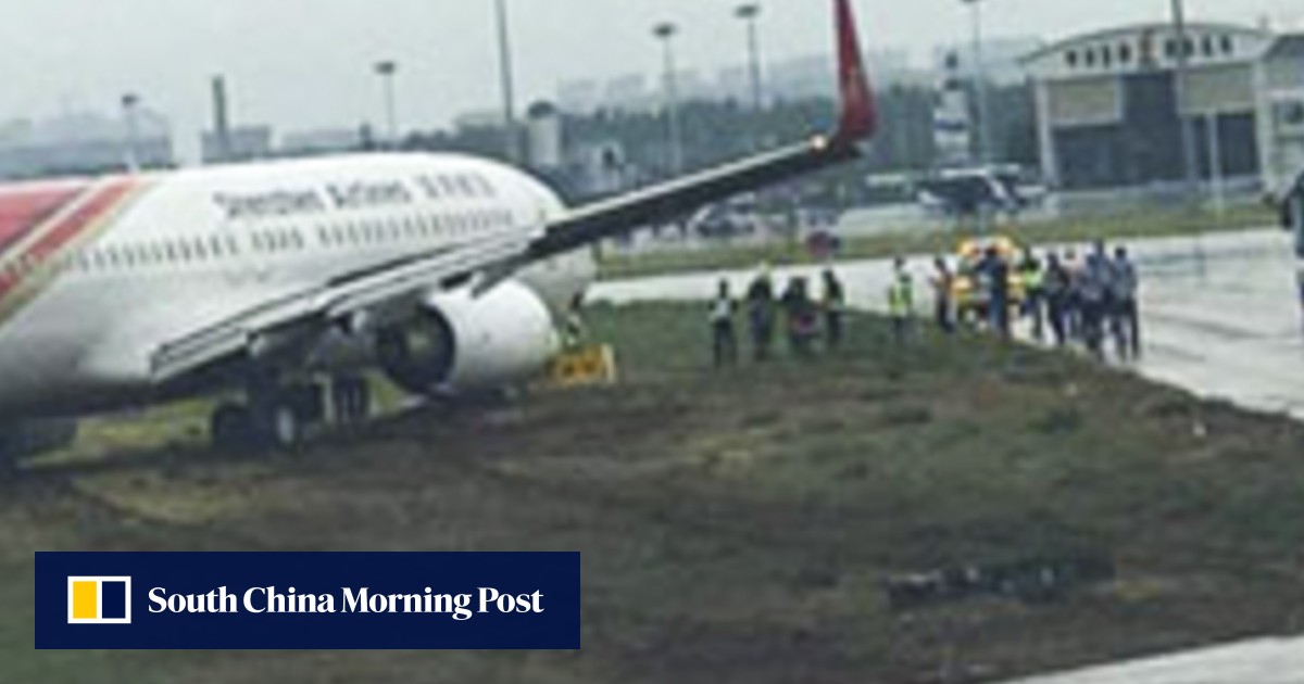 Chinese passenger plane skids off runway after landing | South China ...