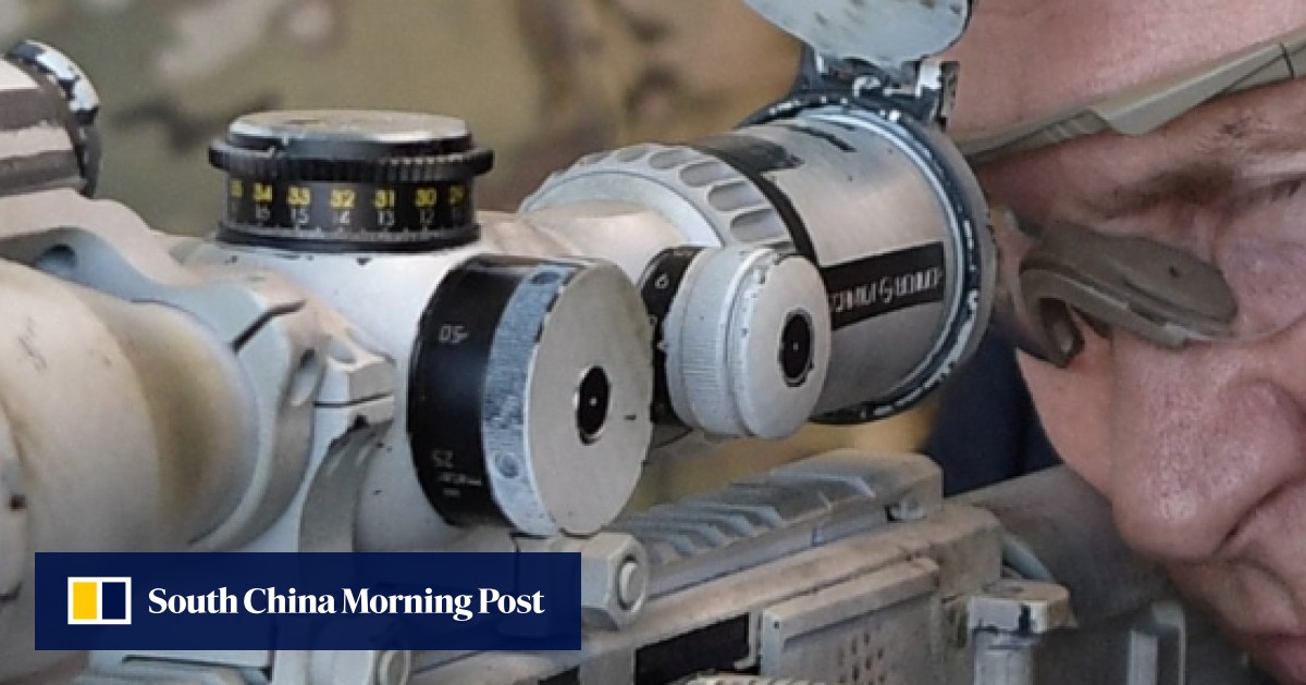 Russian President Putin tests Kalashnikov sniper rifle, ‘firing between ...