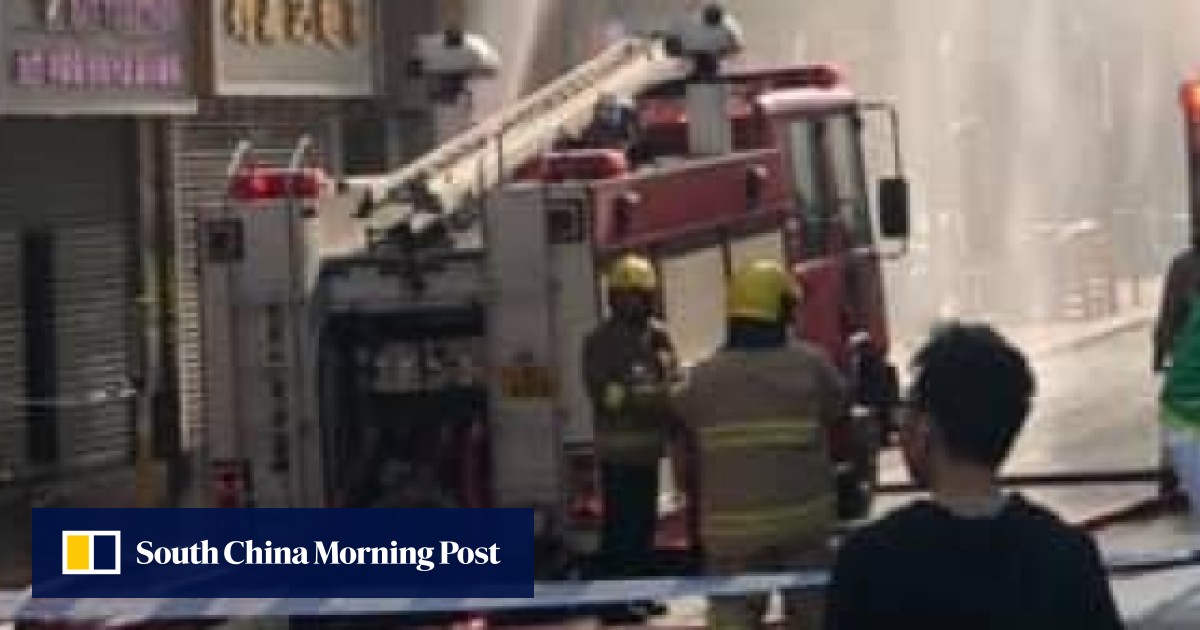 Three people in hospital after fire in Hong Kong tenement block | South ...