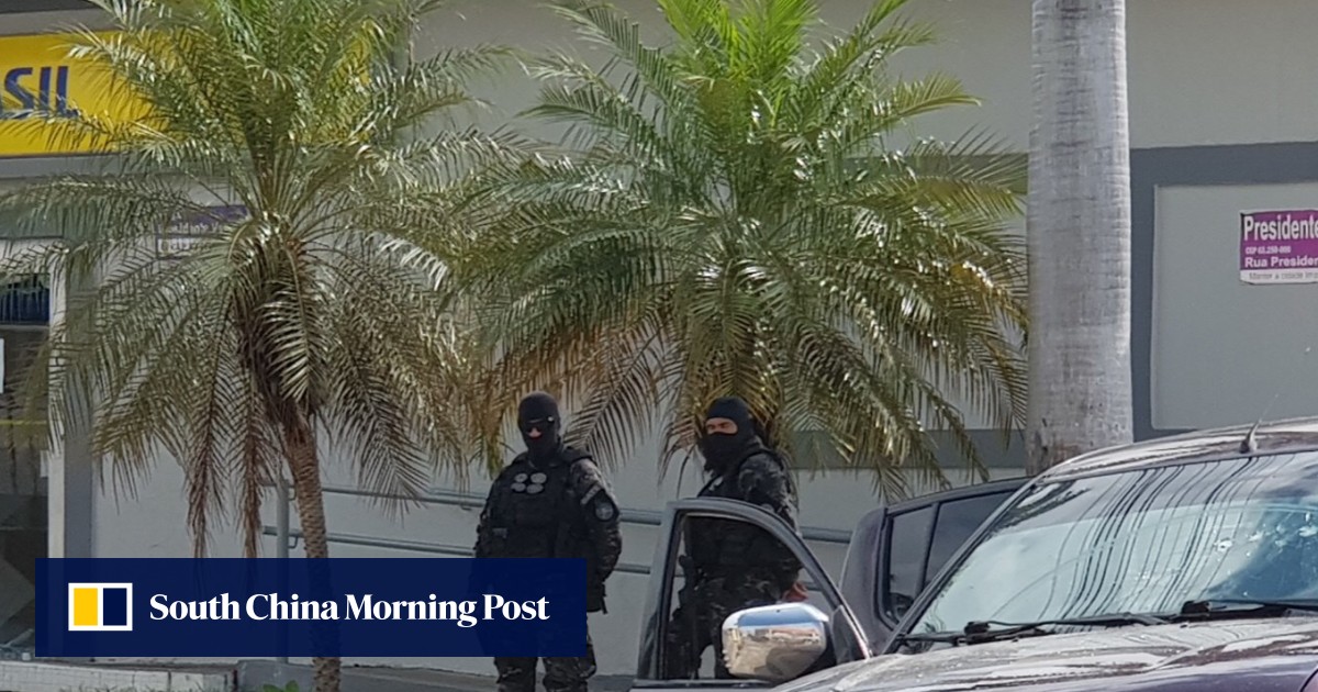 14 killed in shoot-out with police during double bank robbery in small ...