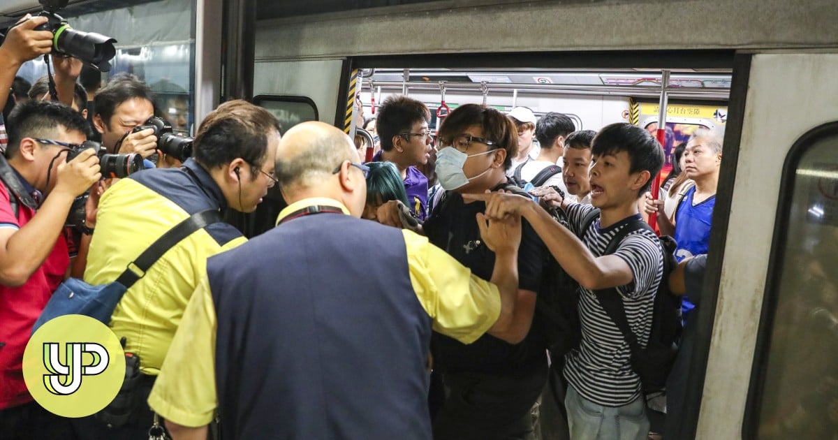HK protests: Rush hour chaos as protesters block train doors - Young ...