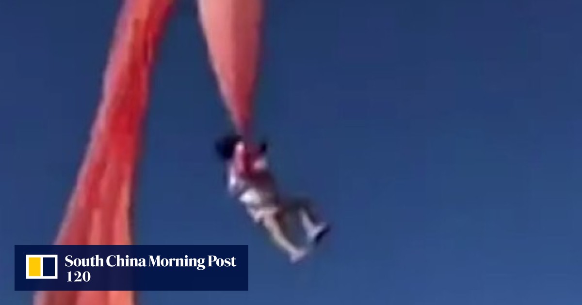 Kite drags girl by the neck over horrified crowd at Taiwan festival ...