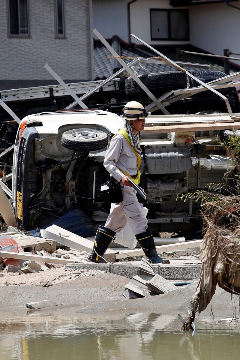 Japan Floods At Least 122 Dead And Dozens Still Missing As Rescue