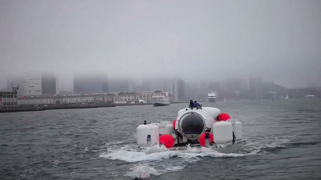 Diving robot joins search for Titanic submersible, which has less than ...